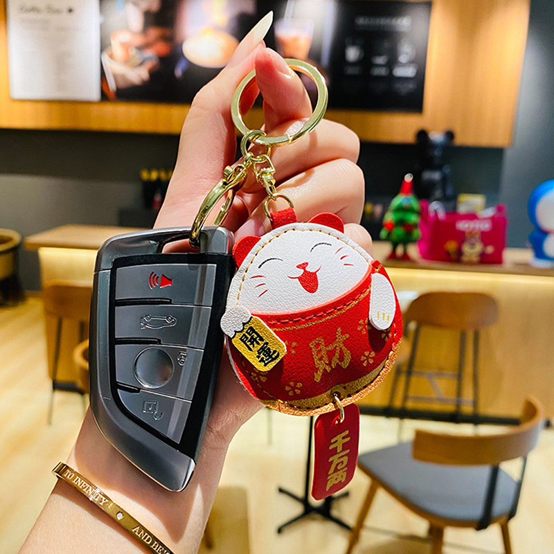 Cartoni animati in pelle rotondo Giappone gatto fortunato portachiavi moda tendenza invito ricchezza Ca ZK